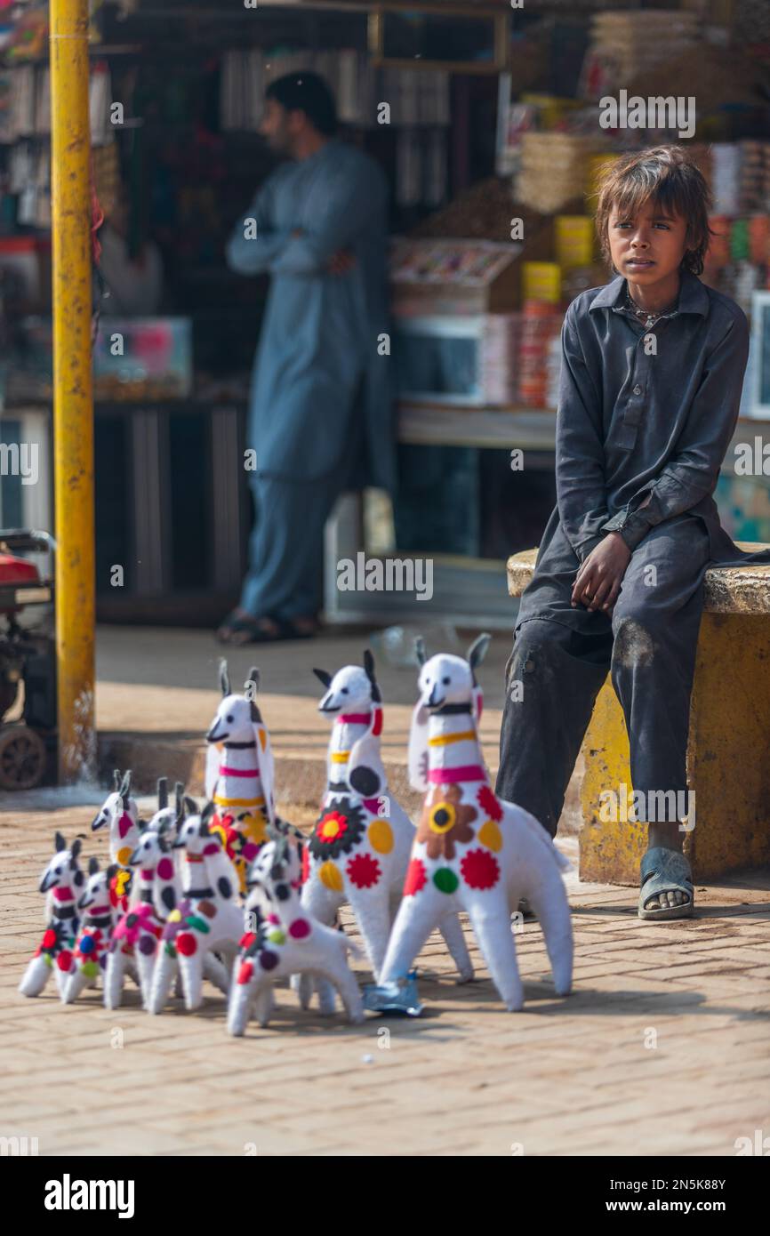 Bhit Shah Sindh Pakistan 2022, A man selling cultural handicrafts and ...