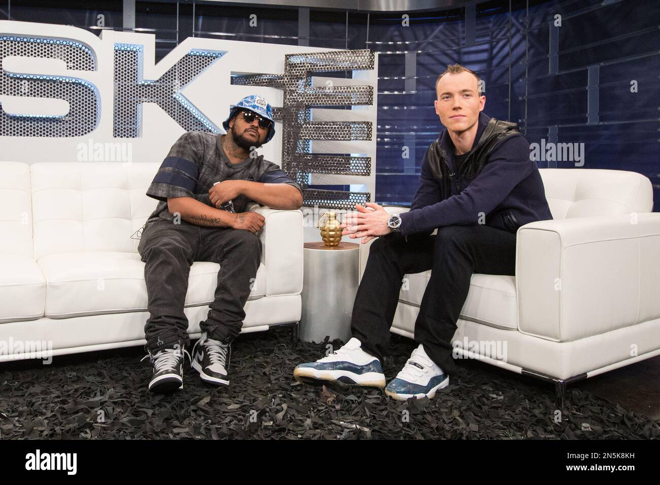 Schoolboy Q (L) and host DJ Skee on set during filming of SKEE Live ...