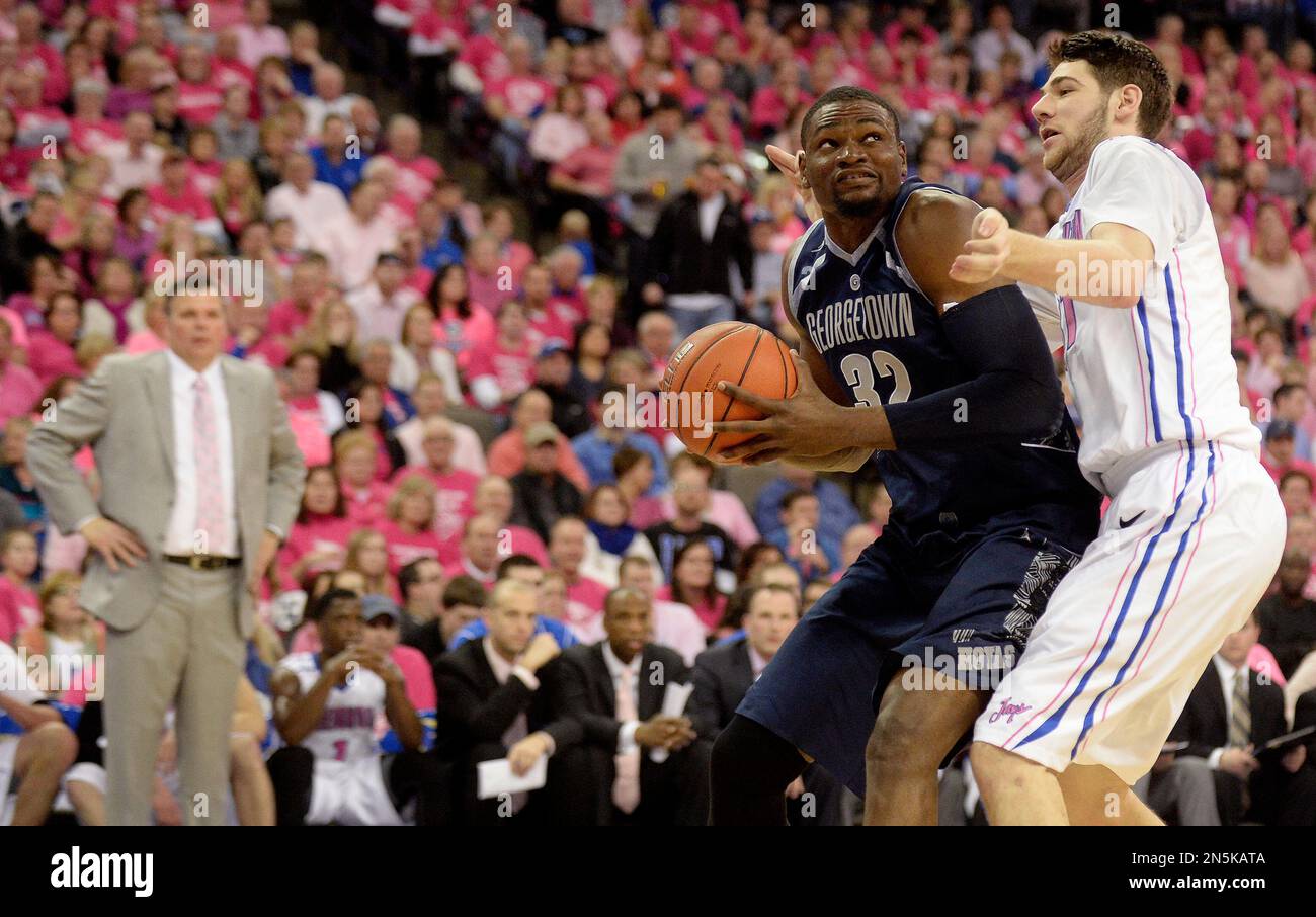 Georgetown center Moses Ayegba (32) drives to the basket against ...