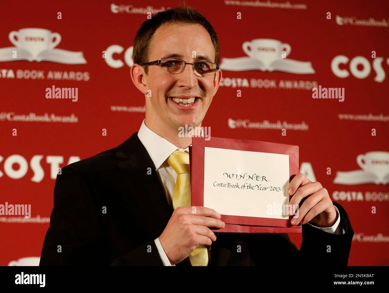 Costa Book of the Year winning author Nathan Filer poses with his prize for his book The Shock ...