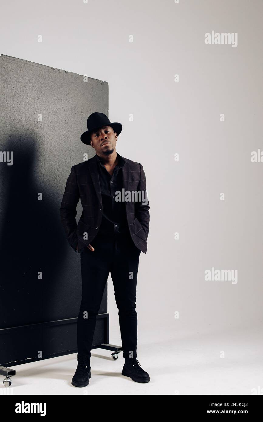 Confident african man poses hi-res stock photography and images - Alamy