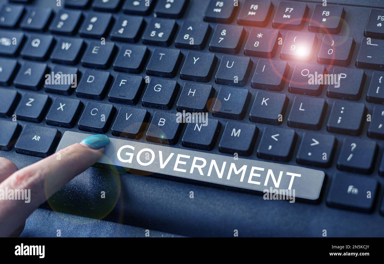 Hand writing sign Government. Word Written on Group of people with ...