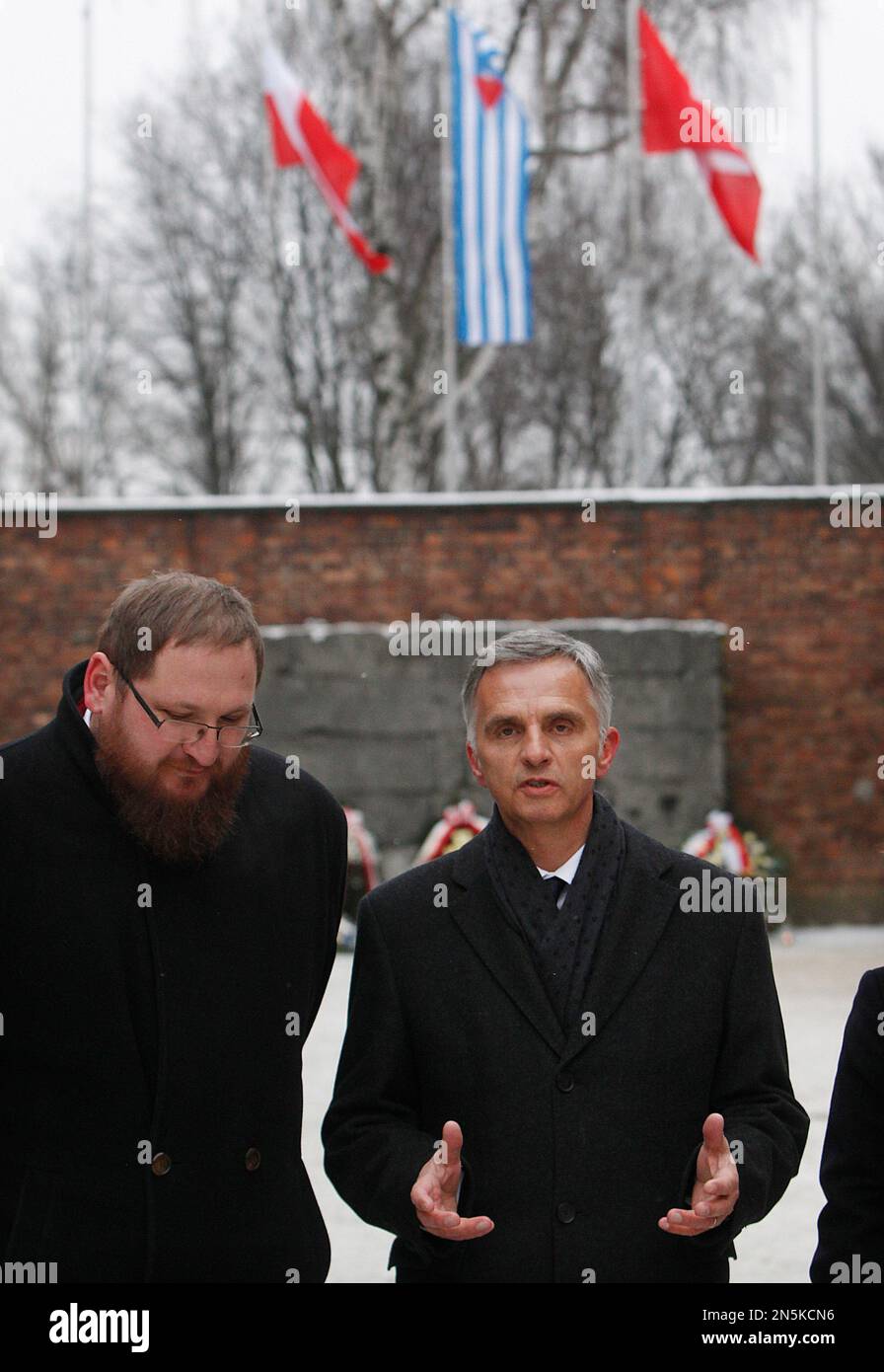Swiss President Didier Burkhalter, right, accompanied by the memorial’s ...