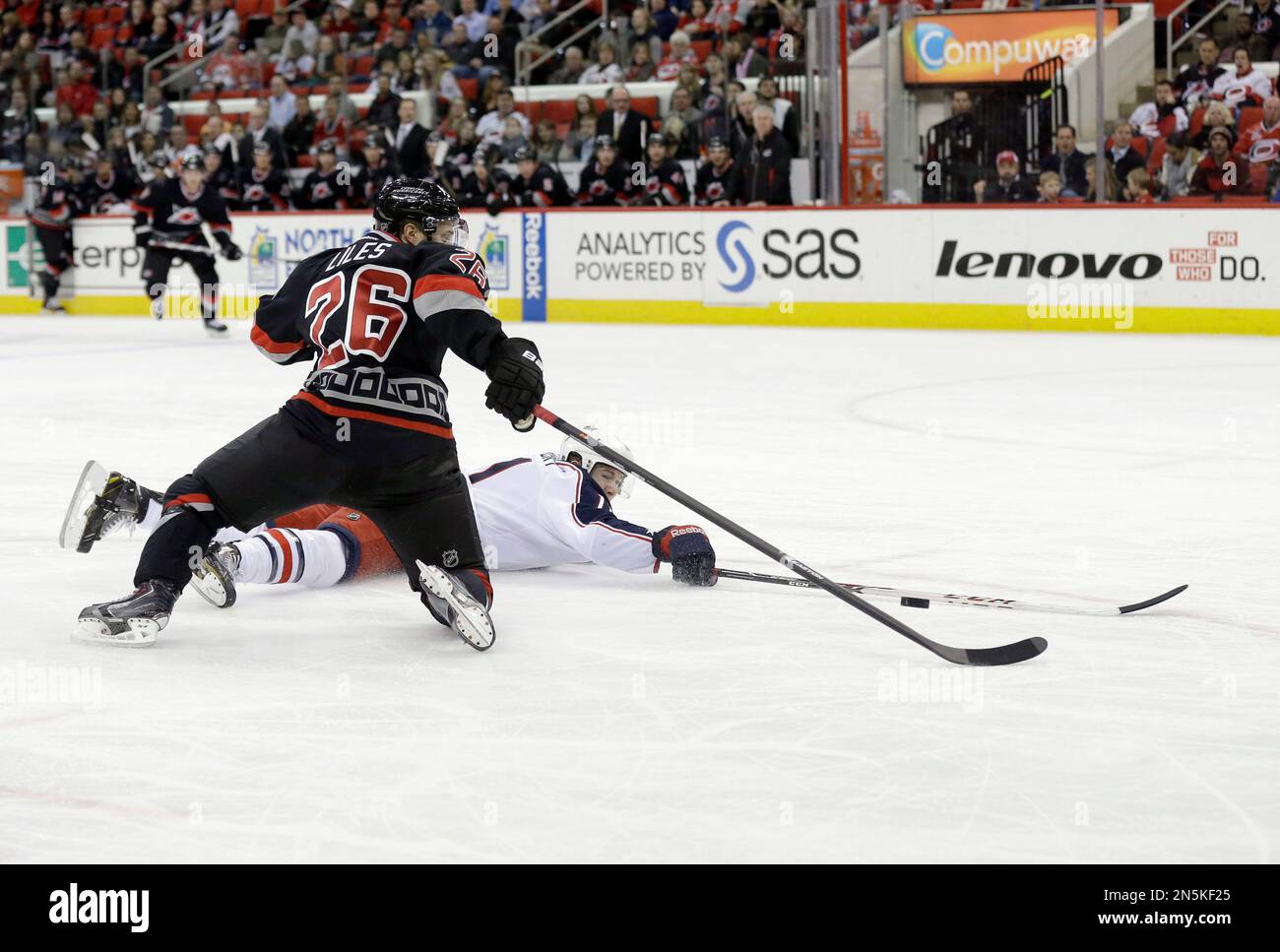 Carolina Hurricanes' John-Michael Liles (26) and Columbus Blue Jacket's ...