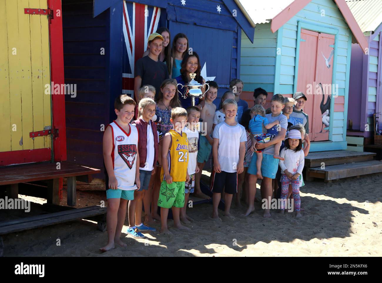 China's Li Na poses for photos at Brighton Beach with her Australian ...