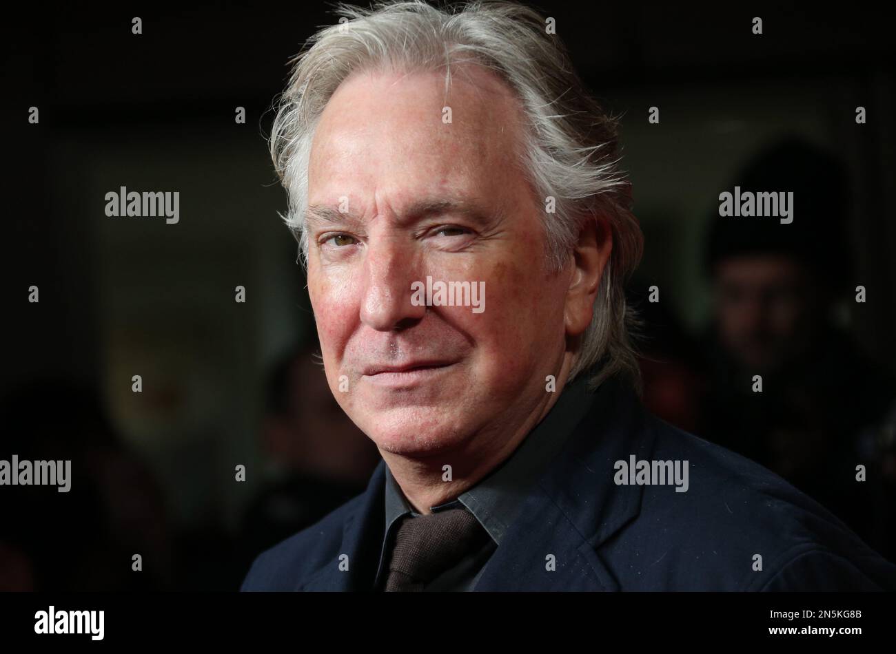 British actor Alan Rickman arrives on the red carpet for the UK ...