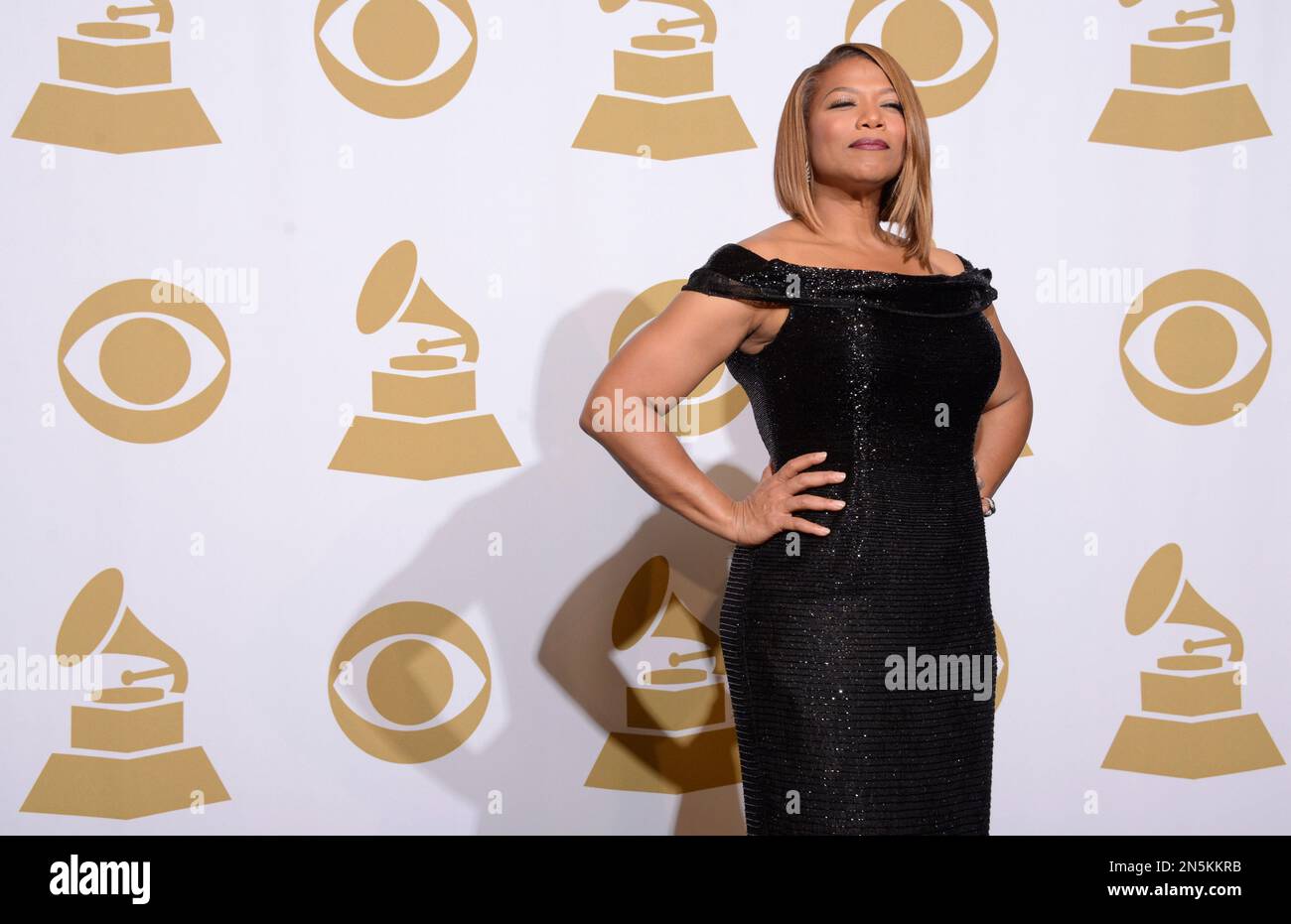 Queen Latifah poses in the press room at the 56th annual GRAMMY Awards ...