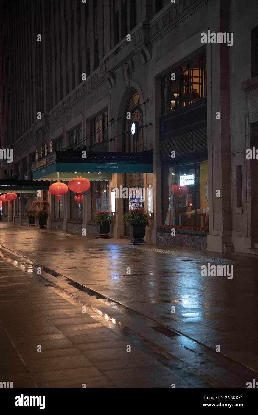 A vertical shot of the British Concession buildings at night near ...