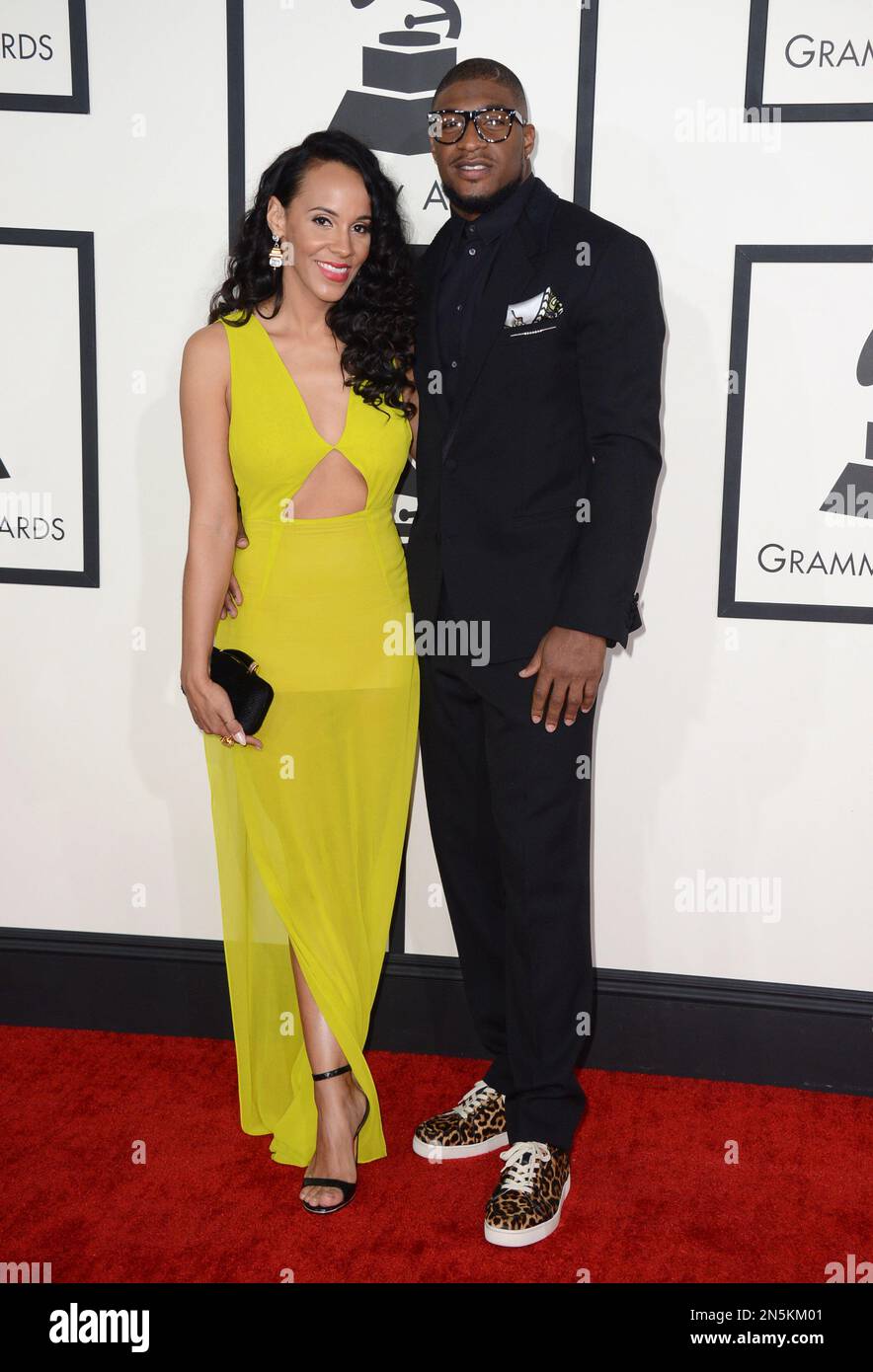Dashon Goldson, right and guest arrive at the 56th annual GRAMMY Awards ...