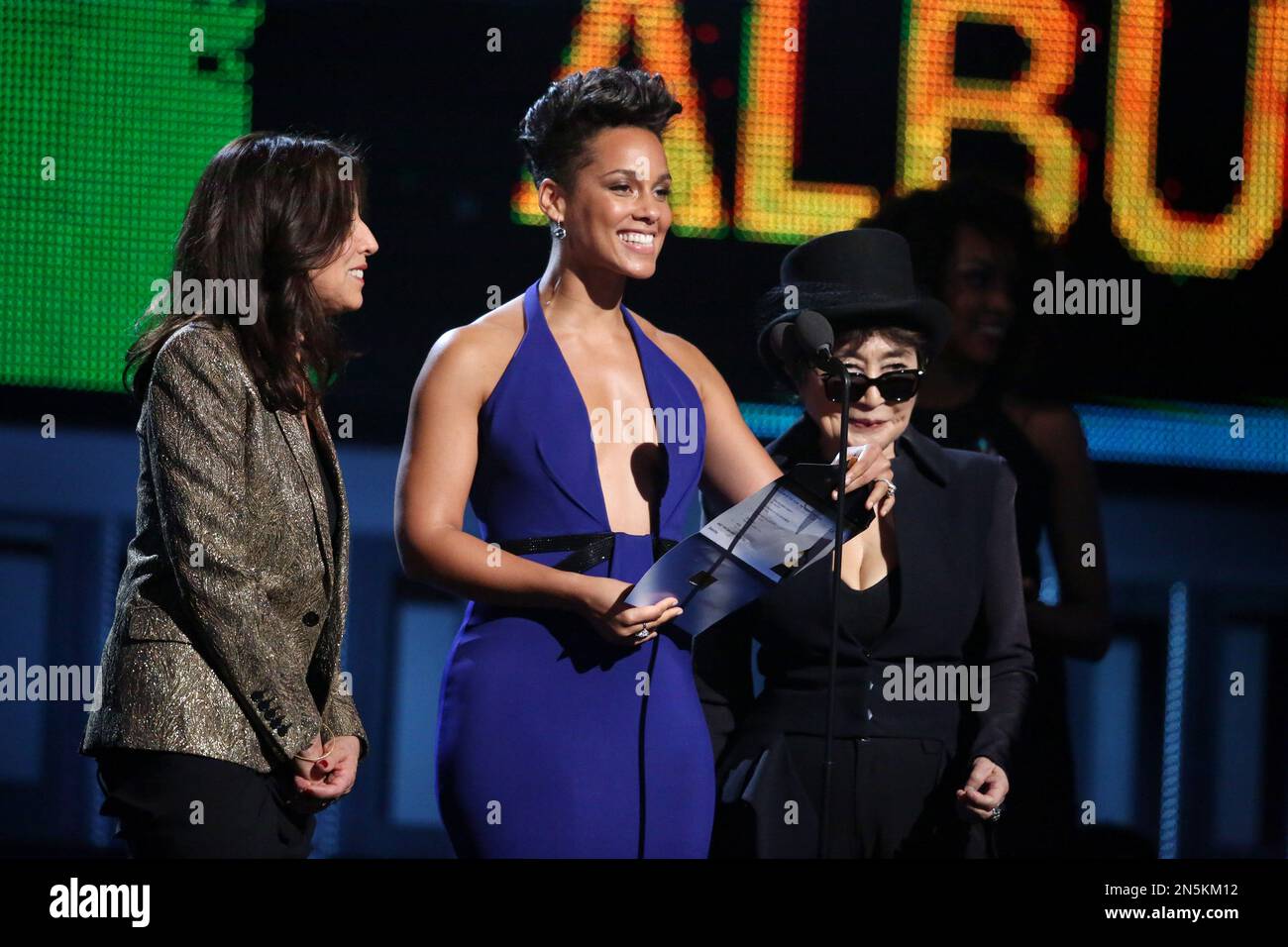 Olivia Harrison From Left Alicia Keys And Yoko Ono Speak On Stage At