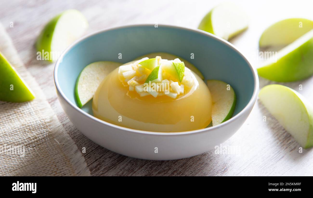 Apple jelly with pieces of fresh fruit Stock Photo - Alamy