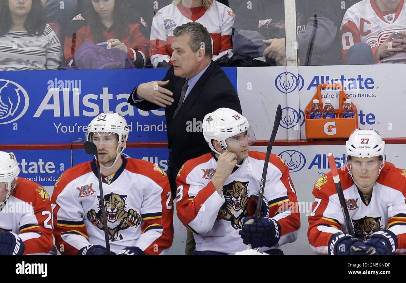 Florida Panthers head coach Peter Horachek signals from the bench ...