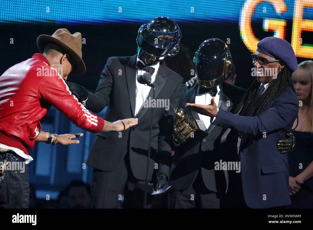 From left, Pharrell Williams, Daft Punk and Nile Rodgers accept the ...