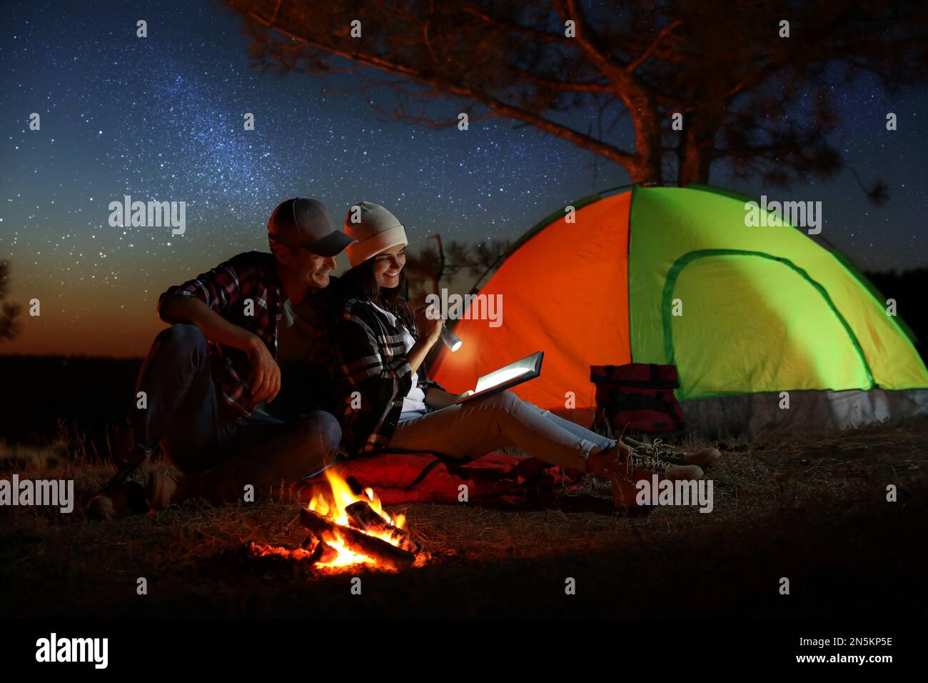 Couple Flashlight Reading Book Hi Res Stock Photography And Images Alamy