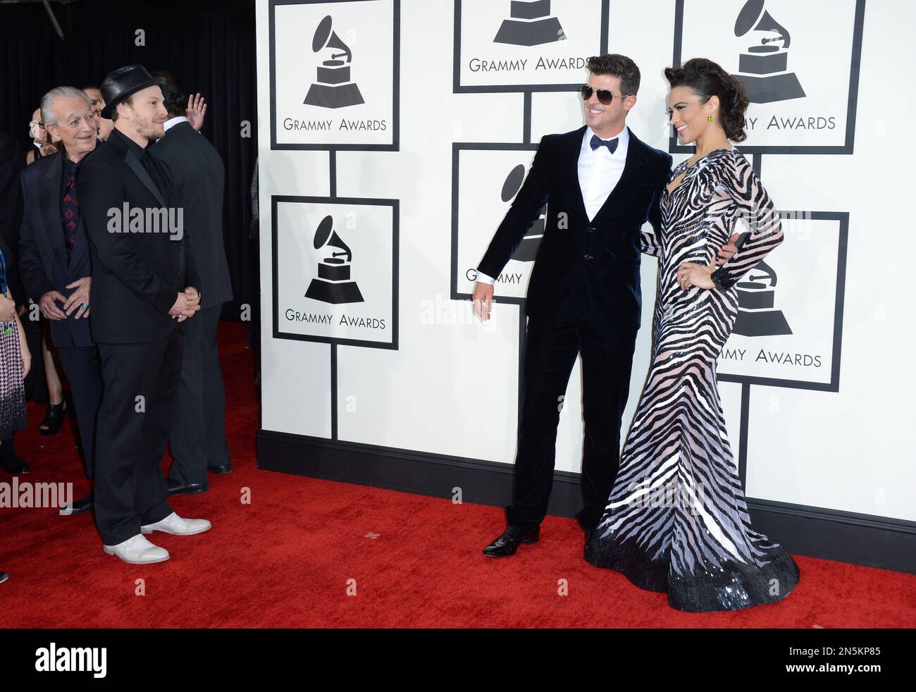 Robin Thicke, left, and Paula Patton arrive at the 56th annual GRAMMY ...