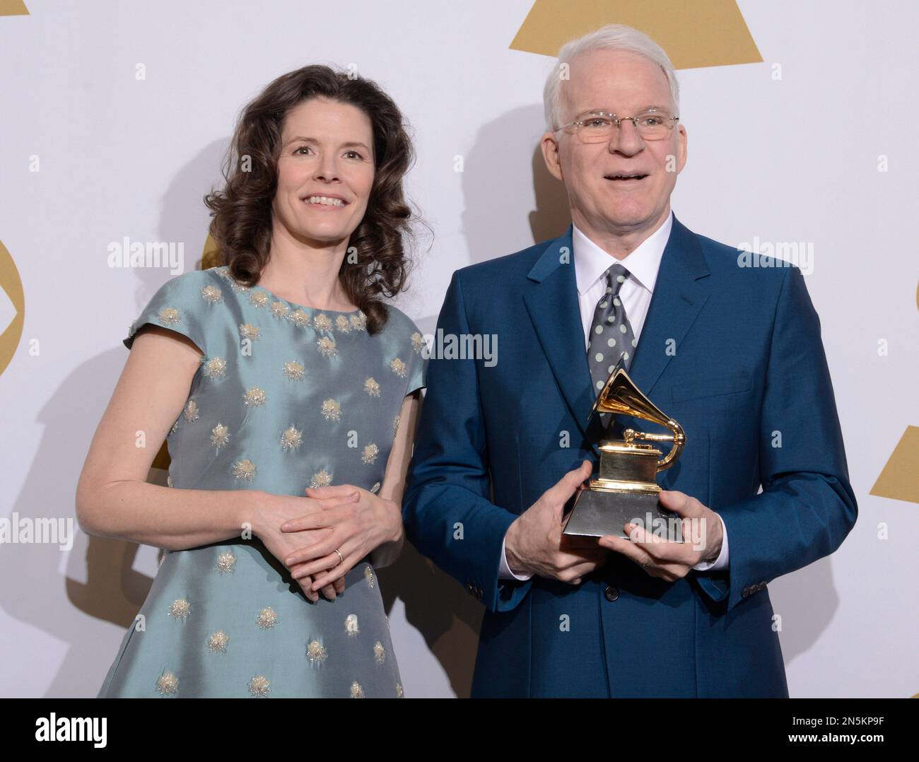 Edie Brickell, left, and Steve Martin pose in the press room with the ...