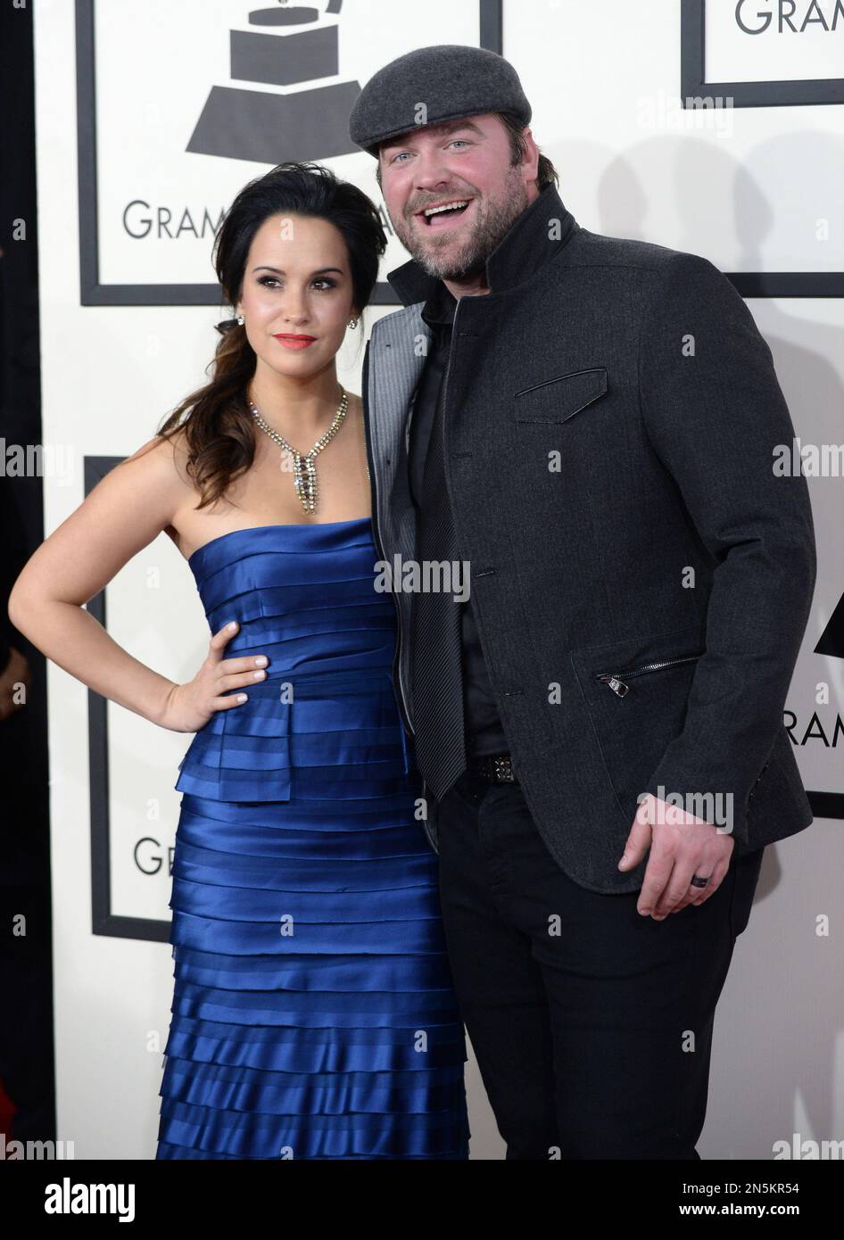 Lee Brice, right, and Sara Brice arrive at the 56th annual GRAMMY ...