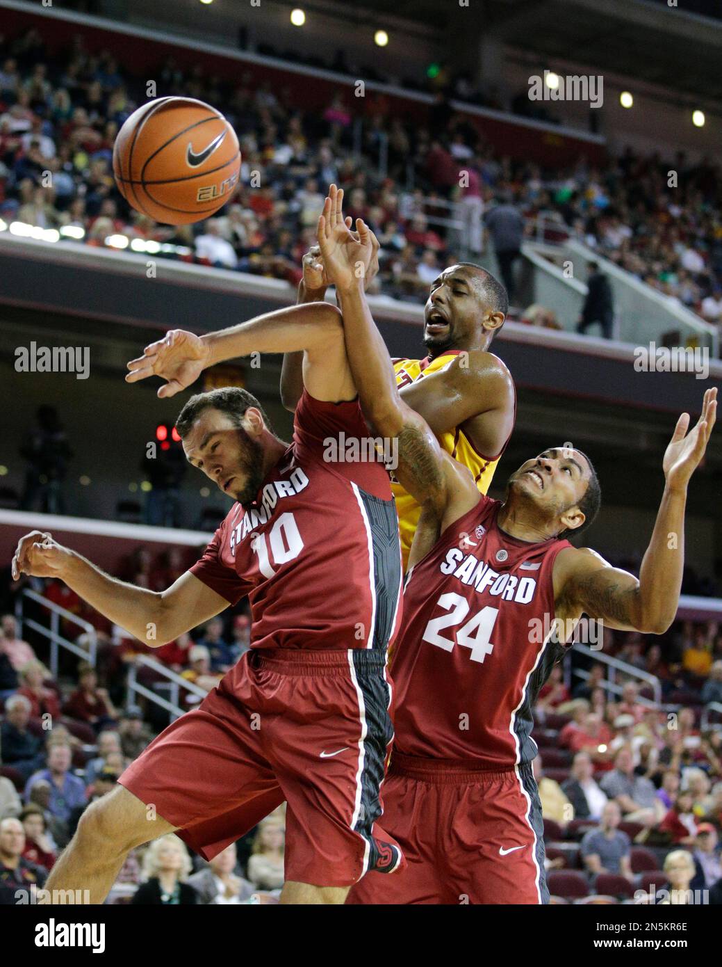 Southern California's Byron Wesley, top center, fights for a rebound ...