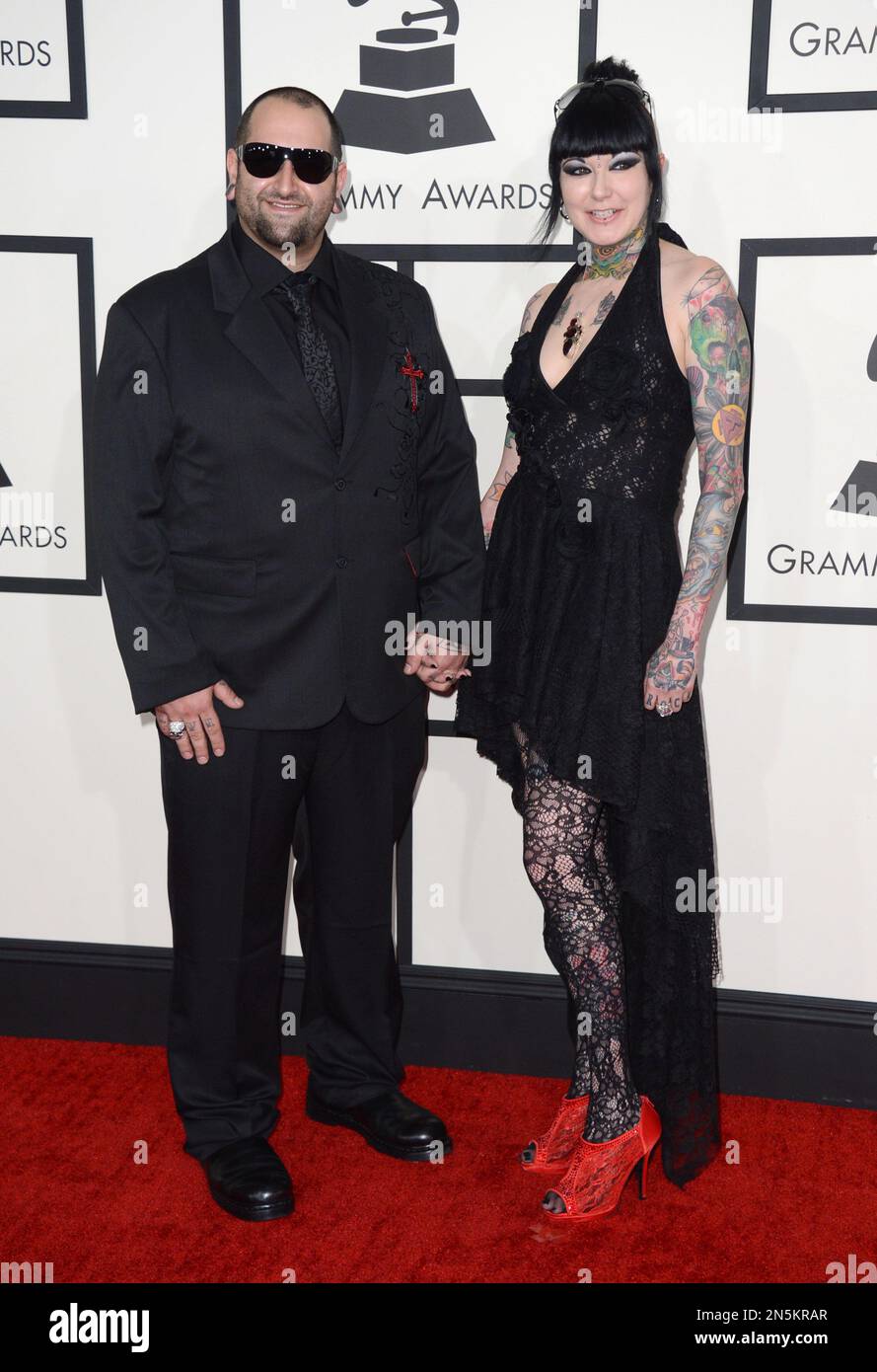 Aaron Rossi, left, and Mandi Martyr arrive at the 56th annual GRAMMY ...