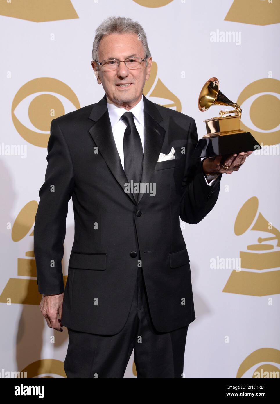 Al Schmitt poses in the press room with the award for best surround ...