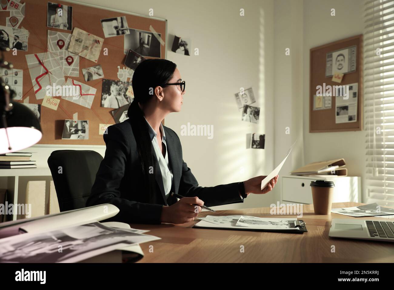 Young police woman desk hi-res stock photography and images - Alamy