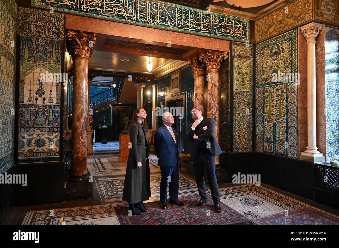 King Charles III (centre) is shown the Arab Hall during a visit to the ...