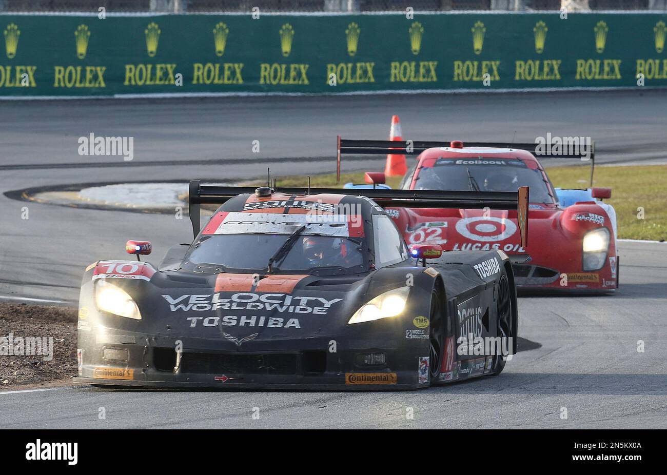 The Wayne Taylor Racing Corvette DP leads the Ganassi Racing Riley DP ...