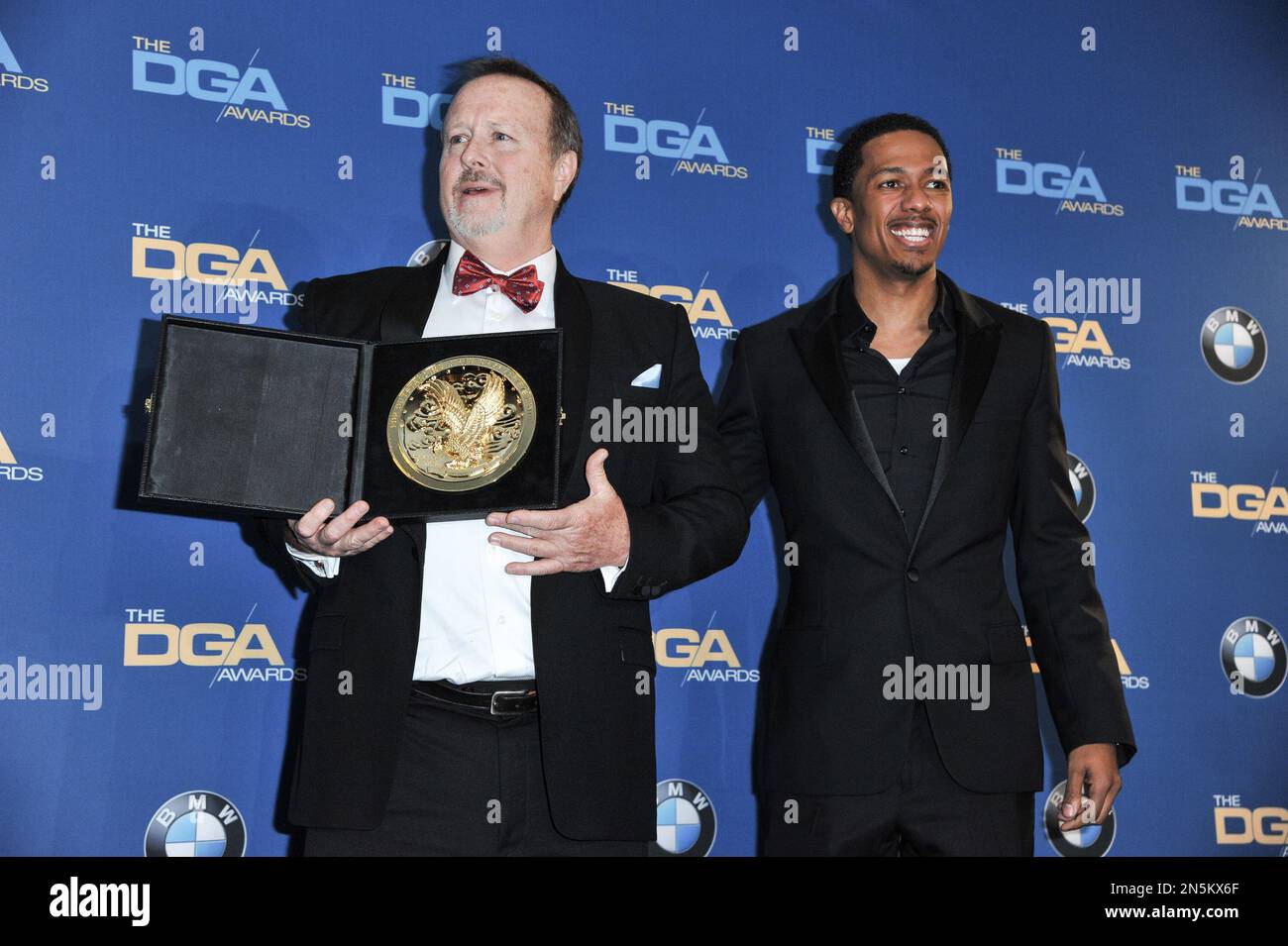 Neil P. DeGroot, left, and Nick Cannon arrive at 66th Annual DGA Awards ...