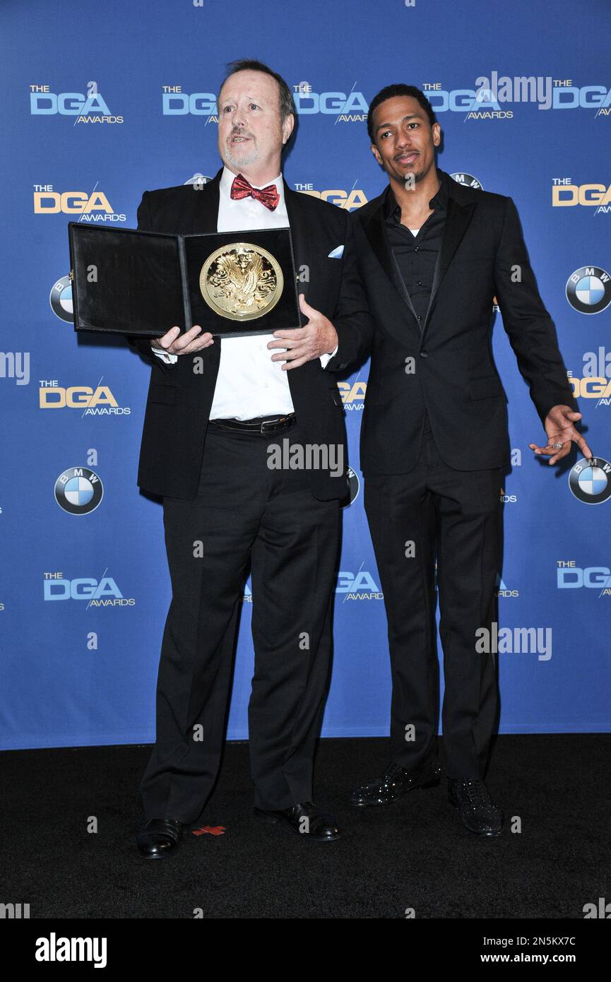 Neil P. DeGroot, left, and Nick Cannon arrive at 66th Annual DGA Awards ...