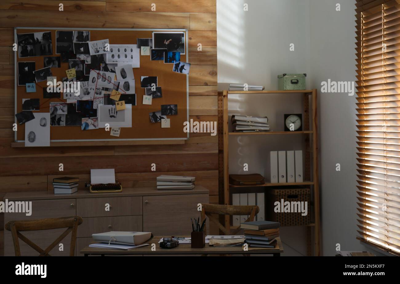 Detective office interior with evidence board on wall Stock Photo - Alamy
