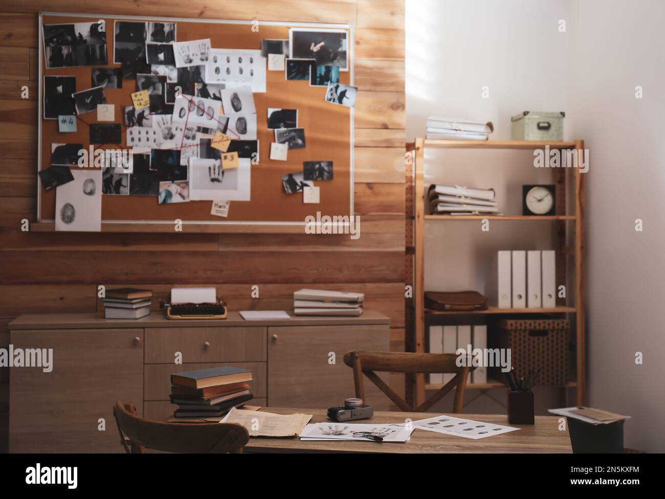 Detective office interior with evidence board on wall Stock Photo - Alamy