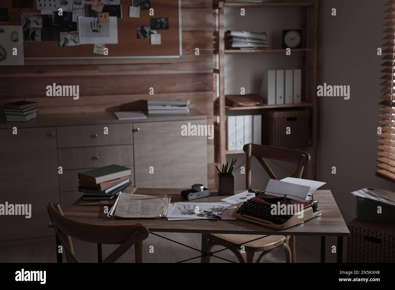 Detective's office interior with wooden desk and evidence board Stock ...