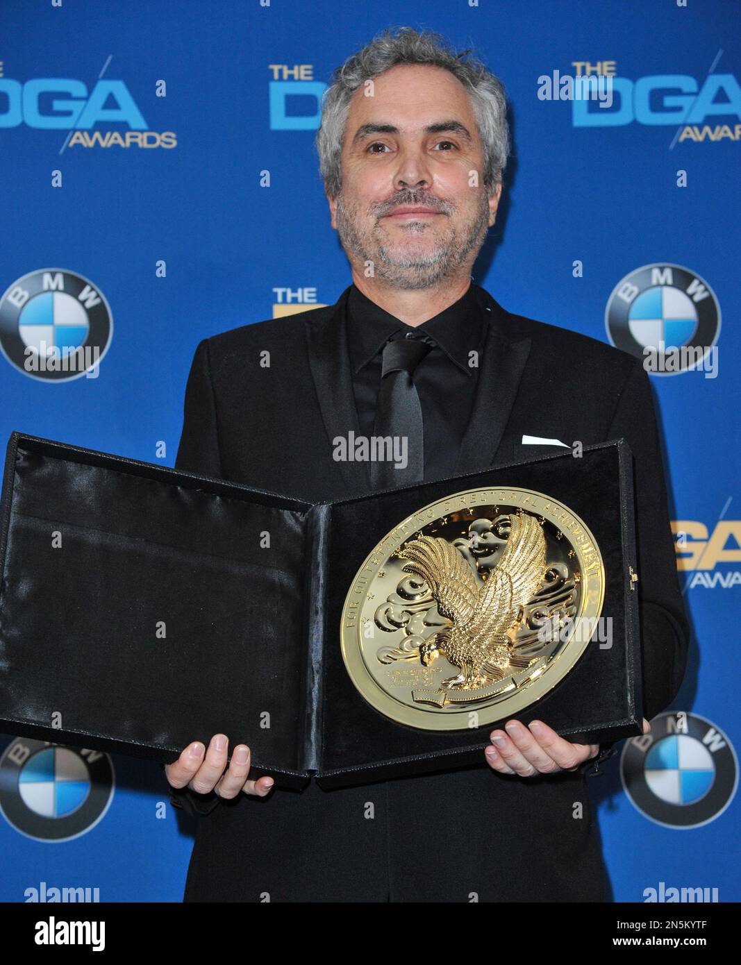 Alfonso Cuarón poses in the press room of the the 66th Annual DGA ...