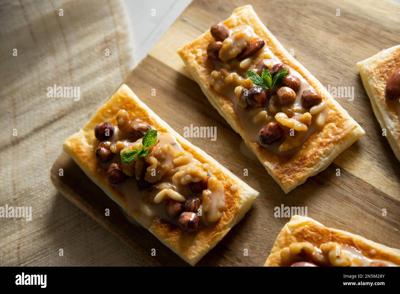 Delicious French dessert made with puff pastry filled with nuts and ...
