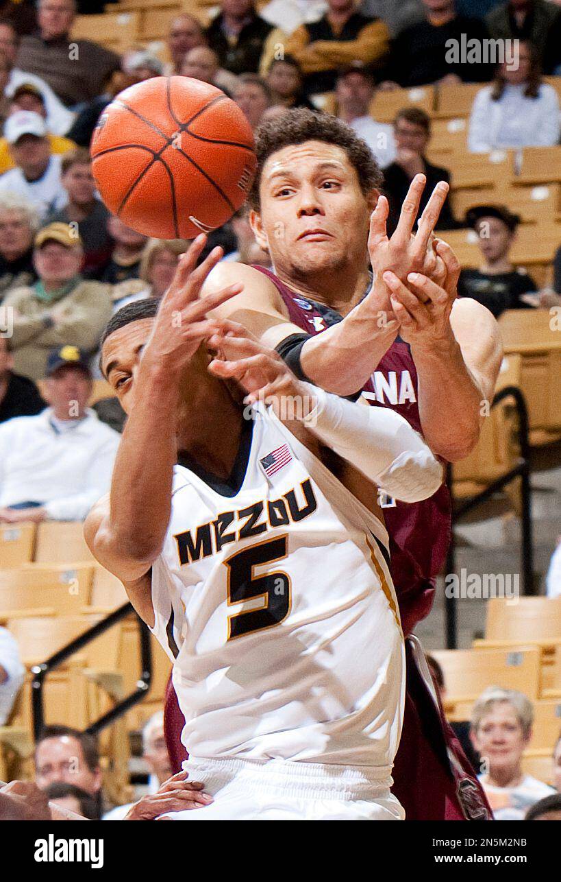 Missouri's Jordan Clarkson, left, and South Carolina's Michael Carrera ...