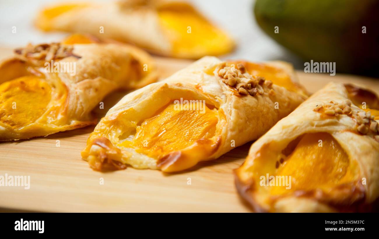 Delicious French dessert made with puff pastry filled with fresh mango ...
