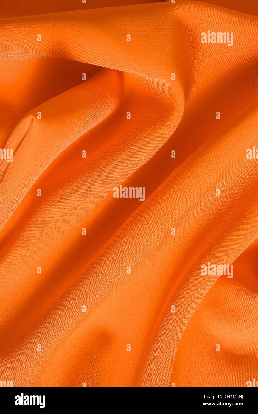 Texture of orange fabric as background, closeup Stock Photo - Alamy
