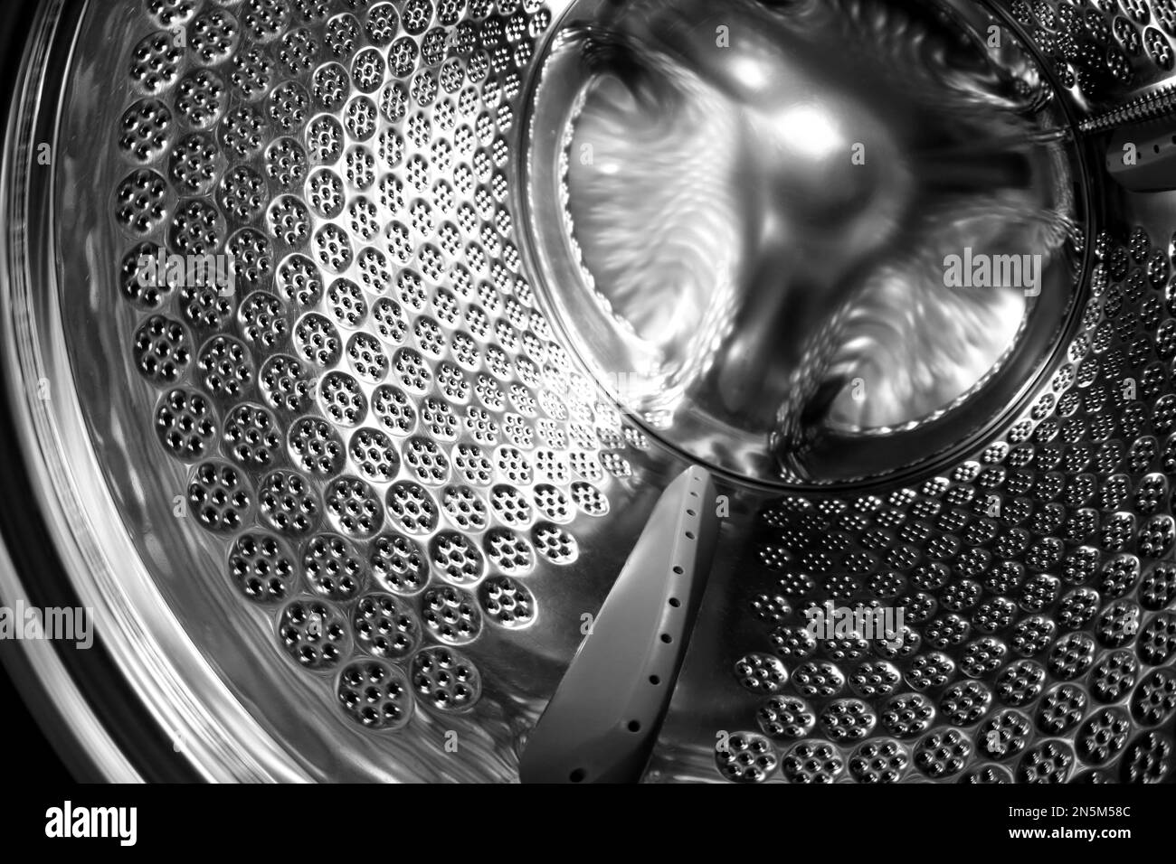 Empty washing machine drum, closeup view. Laundry day Stock Photo - Alamy