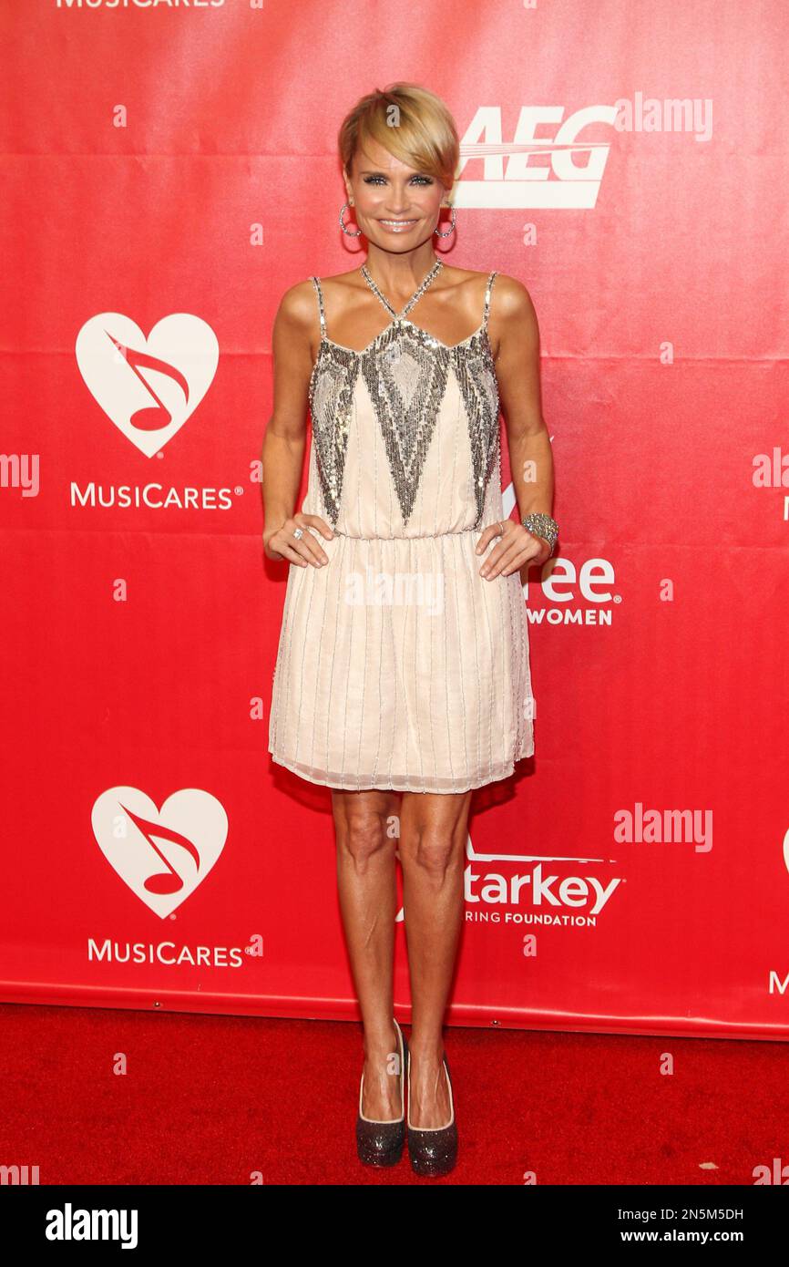 Singer/actress Kristin Chenoweth arrives at the MusiCares 2014 Person ...