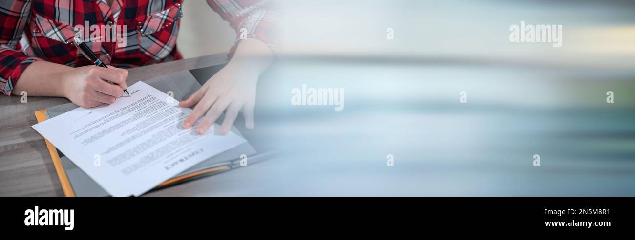 Woman hands signing a contract; panoramic banner Stock Photo - Alamy
