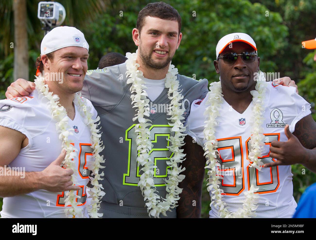 Indianapolis Colts long snapper Matt Overton, left, of Team Rice ...