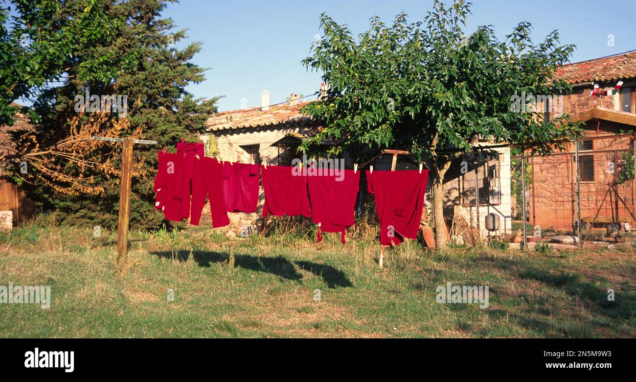 Red laundry to dry in Provence Stock Photo - Alamy