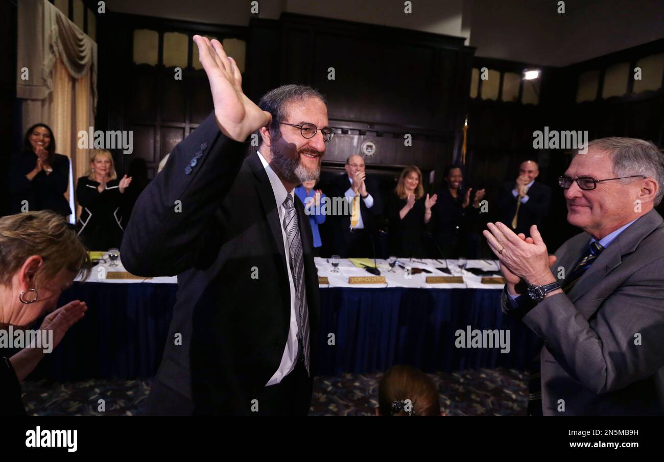 Brown University Provost Mark Schlissel is applauded after being named ...