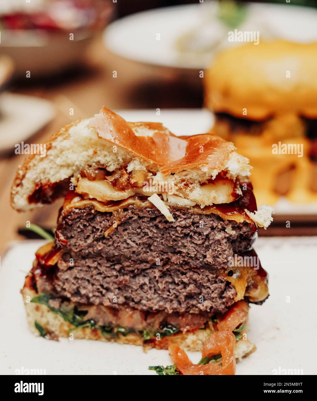 Tremendous double burger with extra cheddar cheese Stock Photo - Alamy