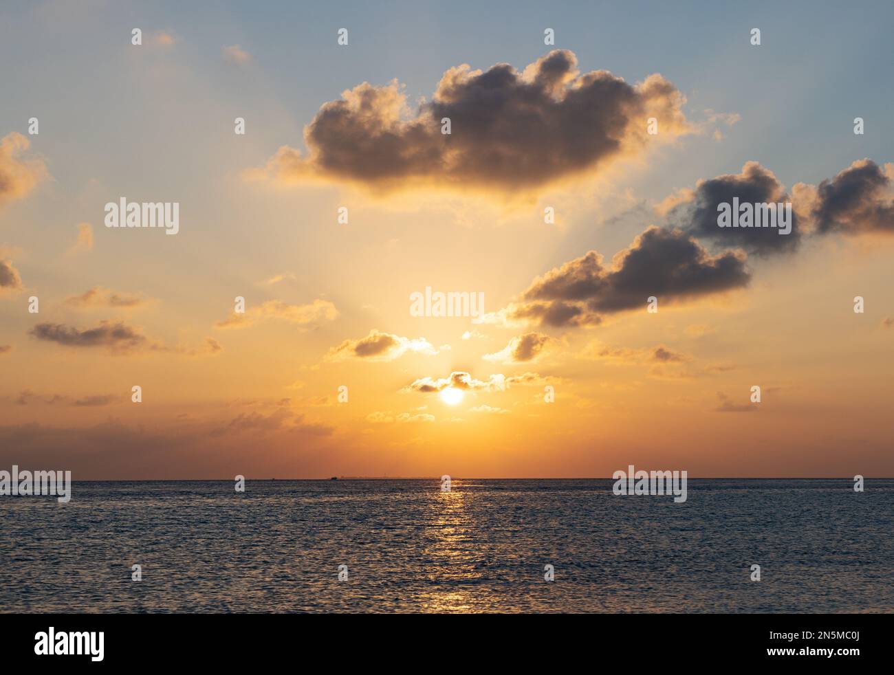 Maldives sunset - tropical sun setting over the Indian Ocean - useful ...