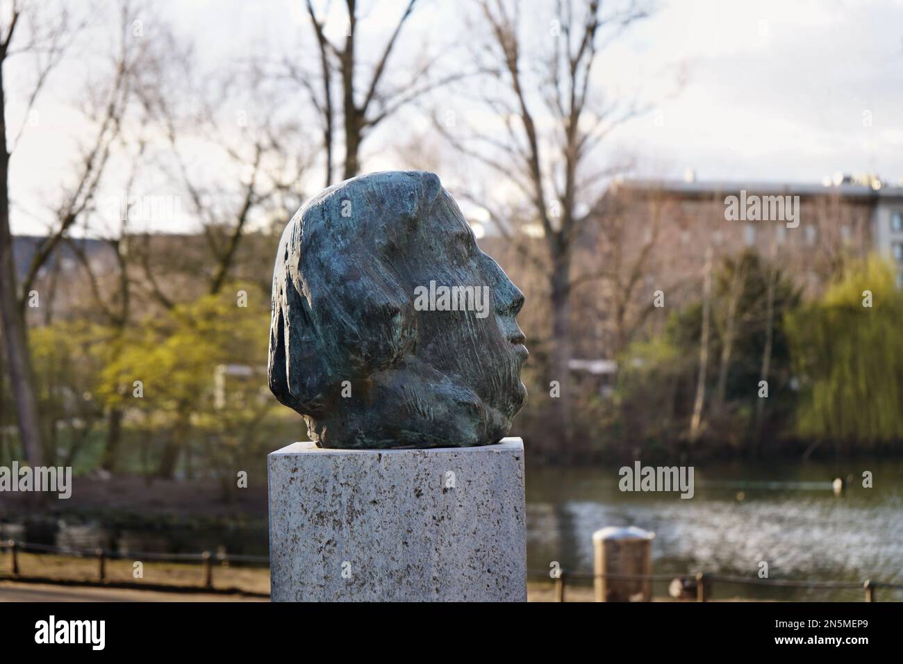 Bronze bust of the German composer Robert Schumann in the public park ...