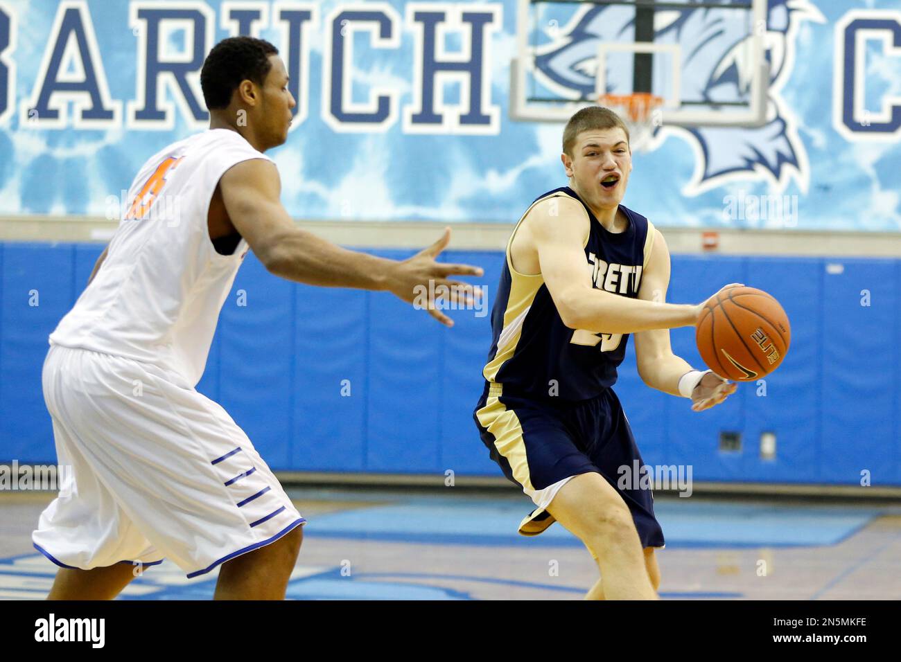 St. Maria Goretti's Martinas Geben #23 in action against St. Raymond ...
