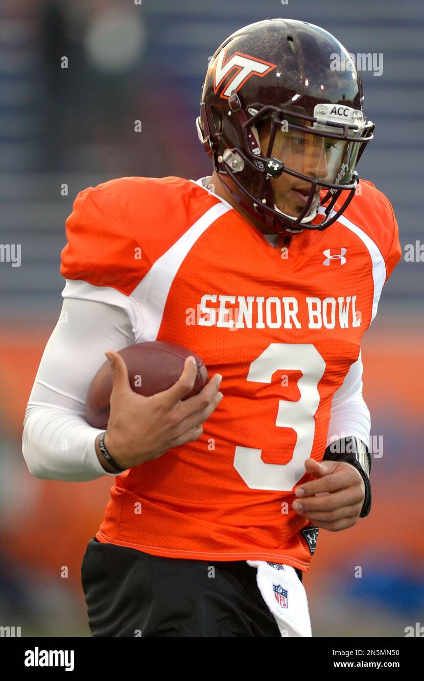 North Squad quarterback Logan Thomas of Virginia Tech (3) runs the ball ...