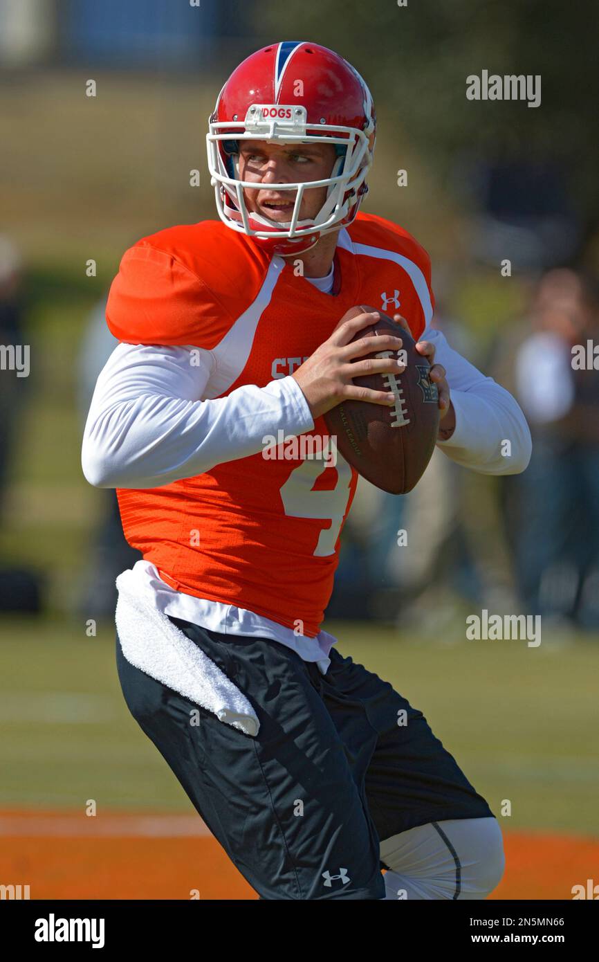South Squad quarterback Derek Carr of Fresno State (4) drops back to ...