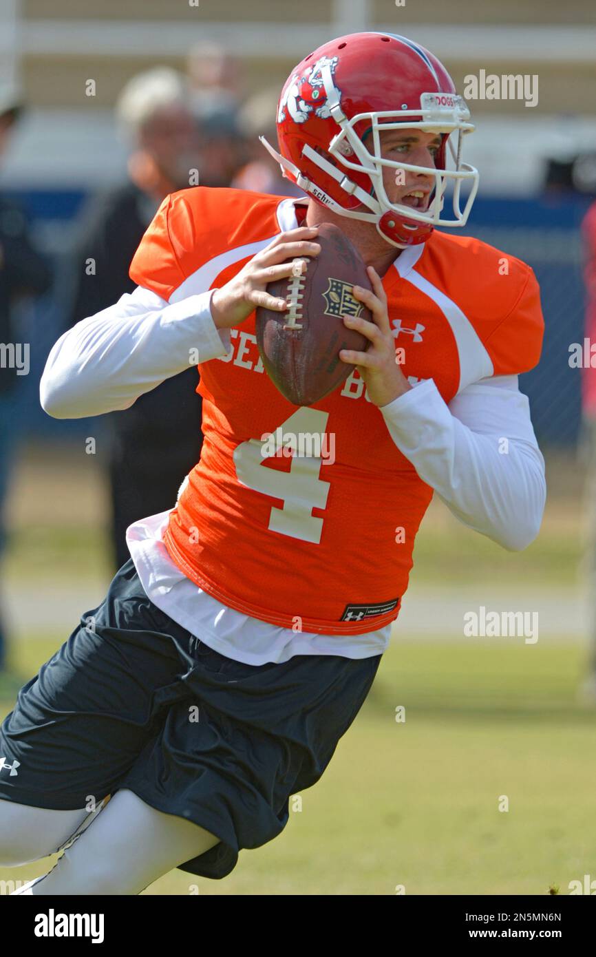 South Squad quarterback Derek Carr of Fresno State (4) looks for a ...